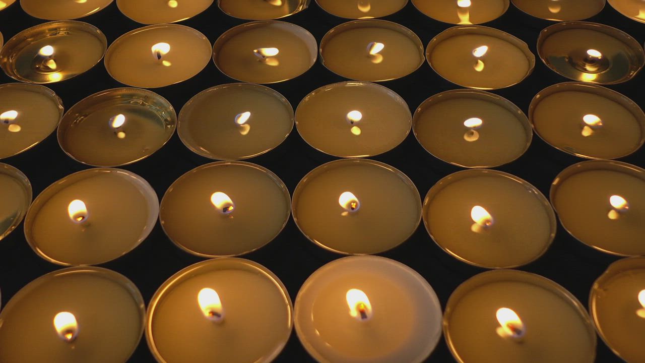 Candles on a dark table - Free Stock Video