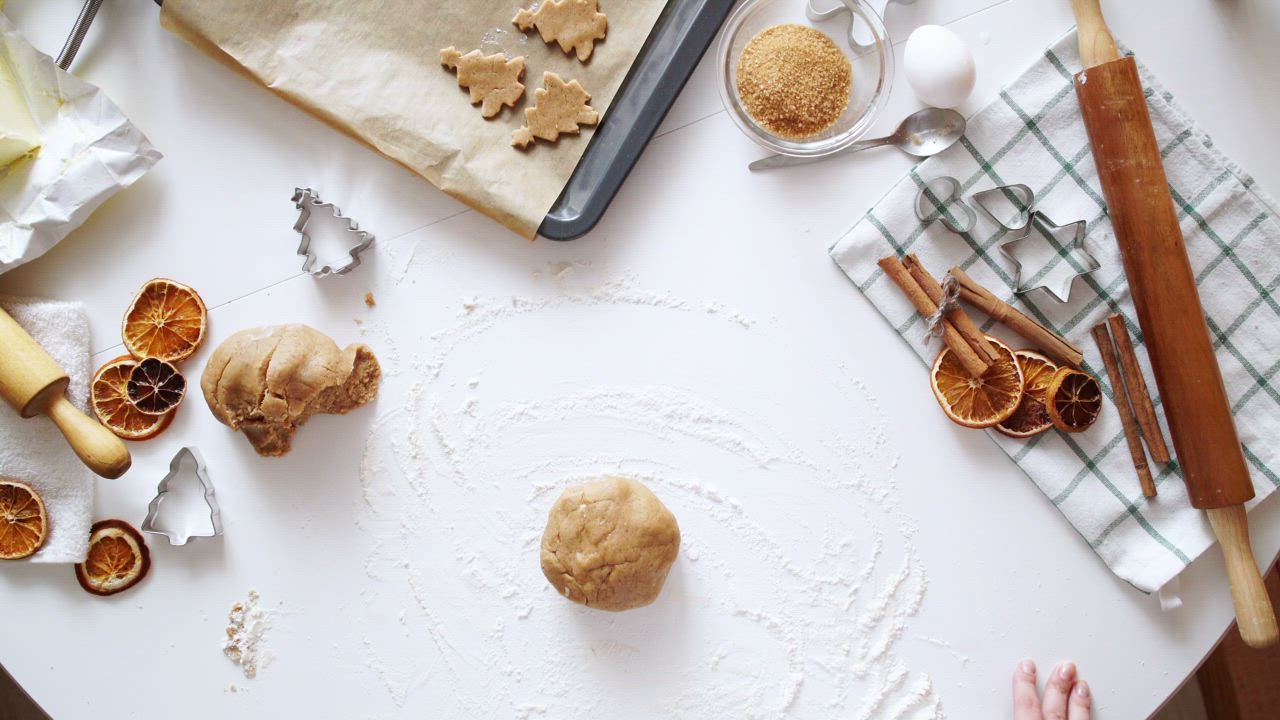 Top view of rolling cookie dough, cinnamon and baking tools - Free ...