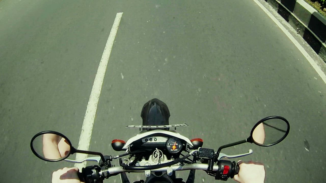 POV of motorcycle chopper driving on road - Free Stock Video