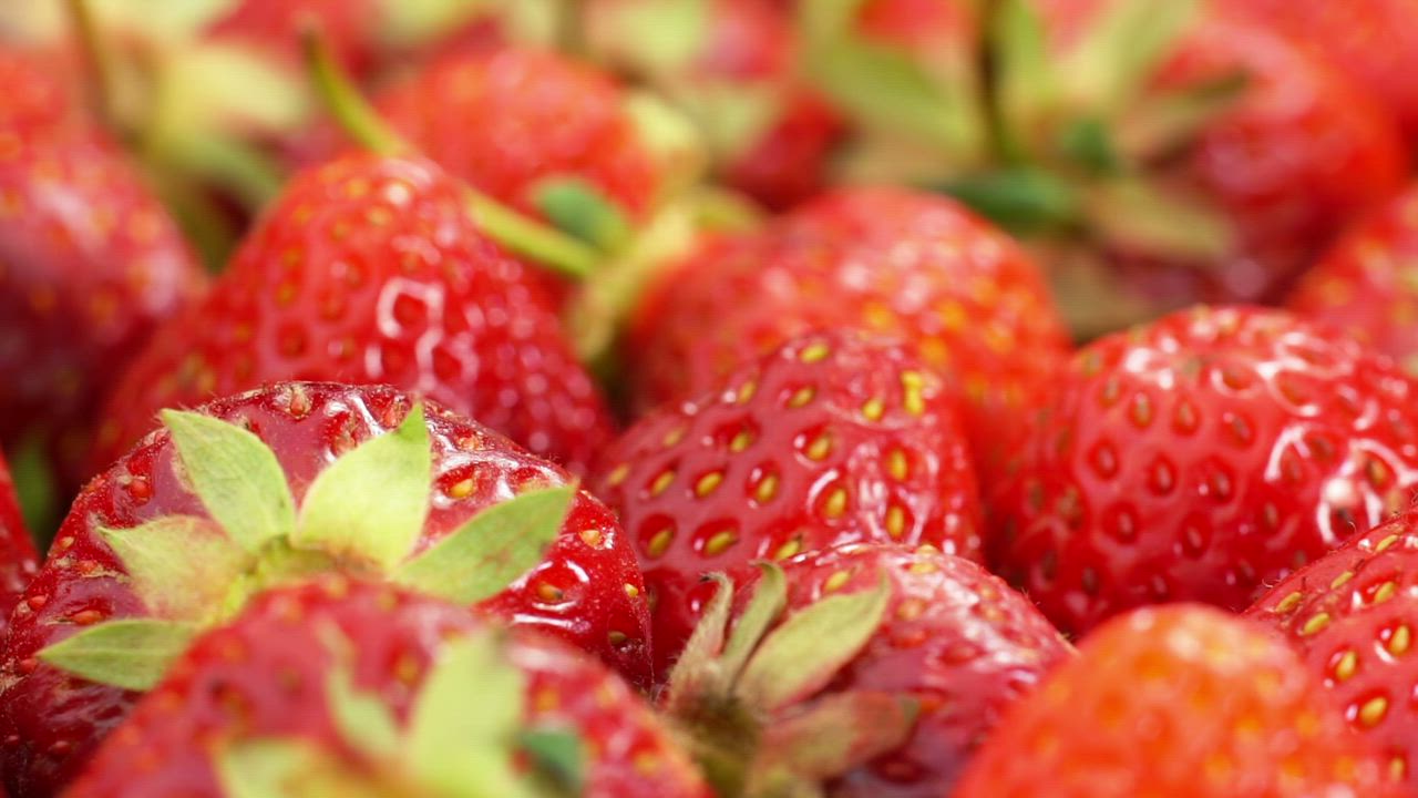 Bunch of strawberries rotating - Free Stock Video