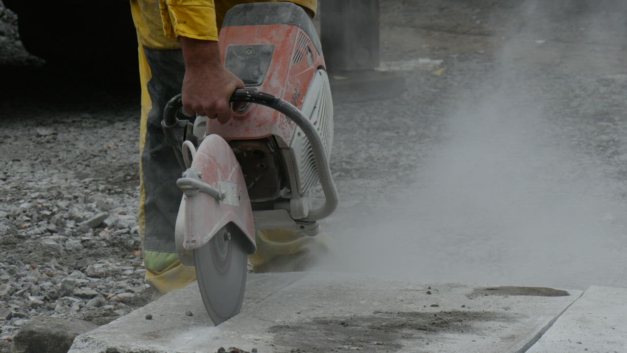Man using an industrial cutter - Free Stock Video