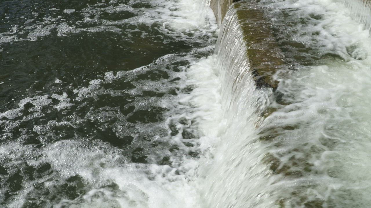 Water rushing over steps - Free Stock Video