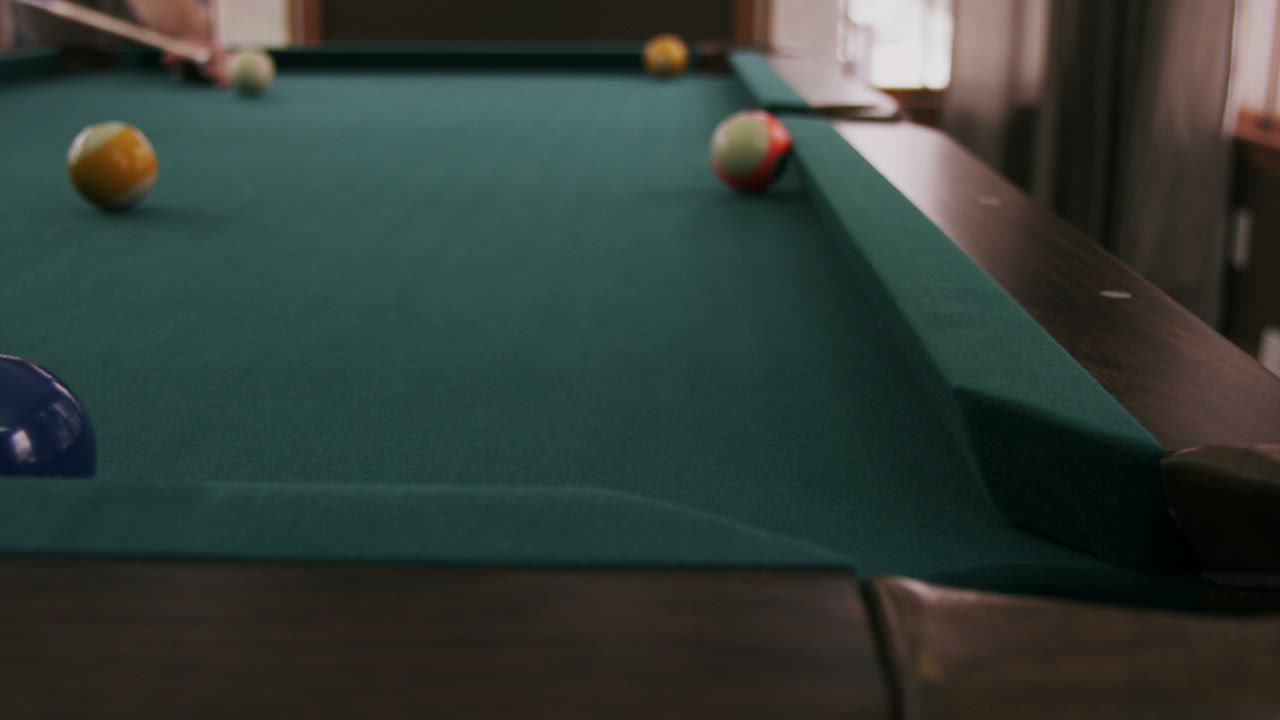 Potting stripes on a Pool table - Free Stock Video