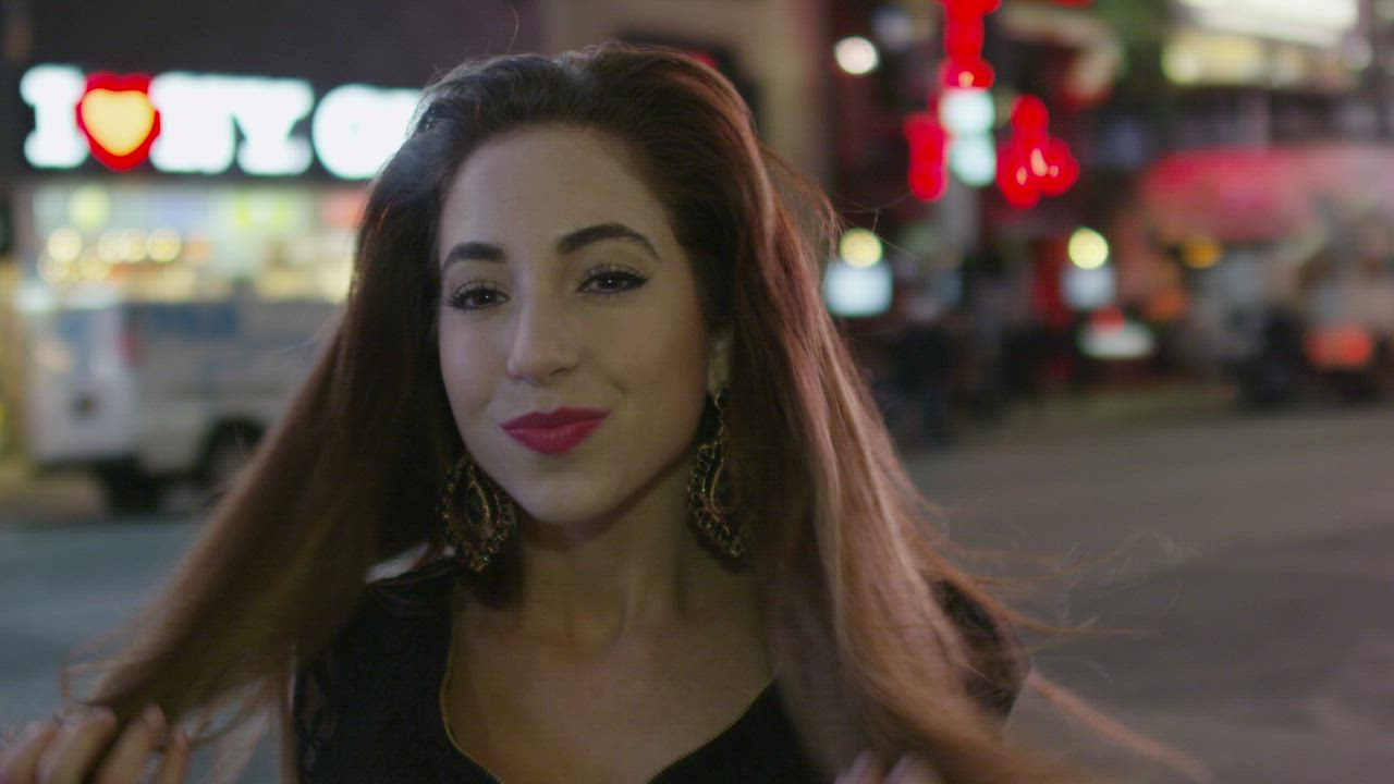 Woman smiling in Times Square - Free Stock Video