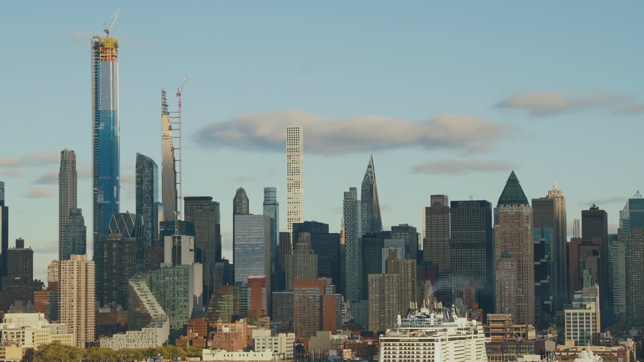 Clouds casting shadows over the city - Free Stock Video