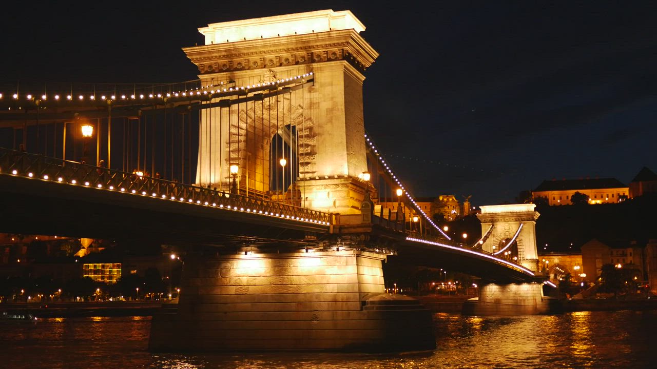 Illuminated bridge at night, time-lapse - Free Stock Video