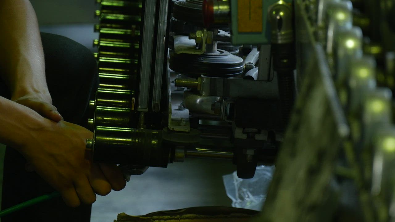 Working on a mechanical machine - Free Stock Video