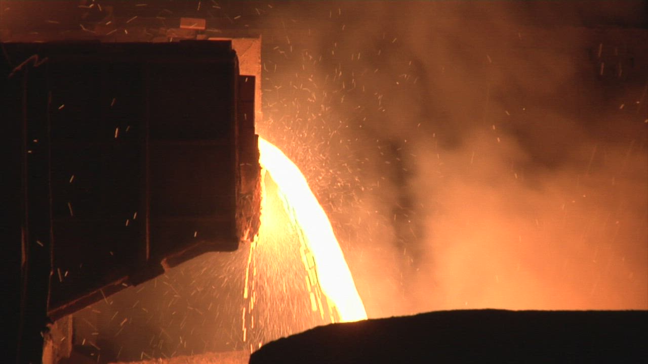 Liquid metal and steam - Free Stock Video