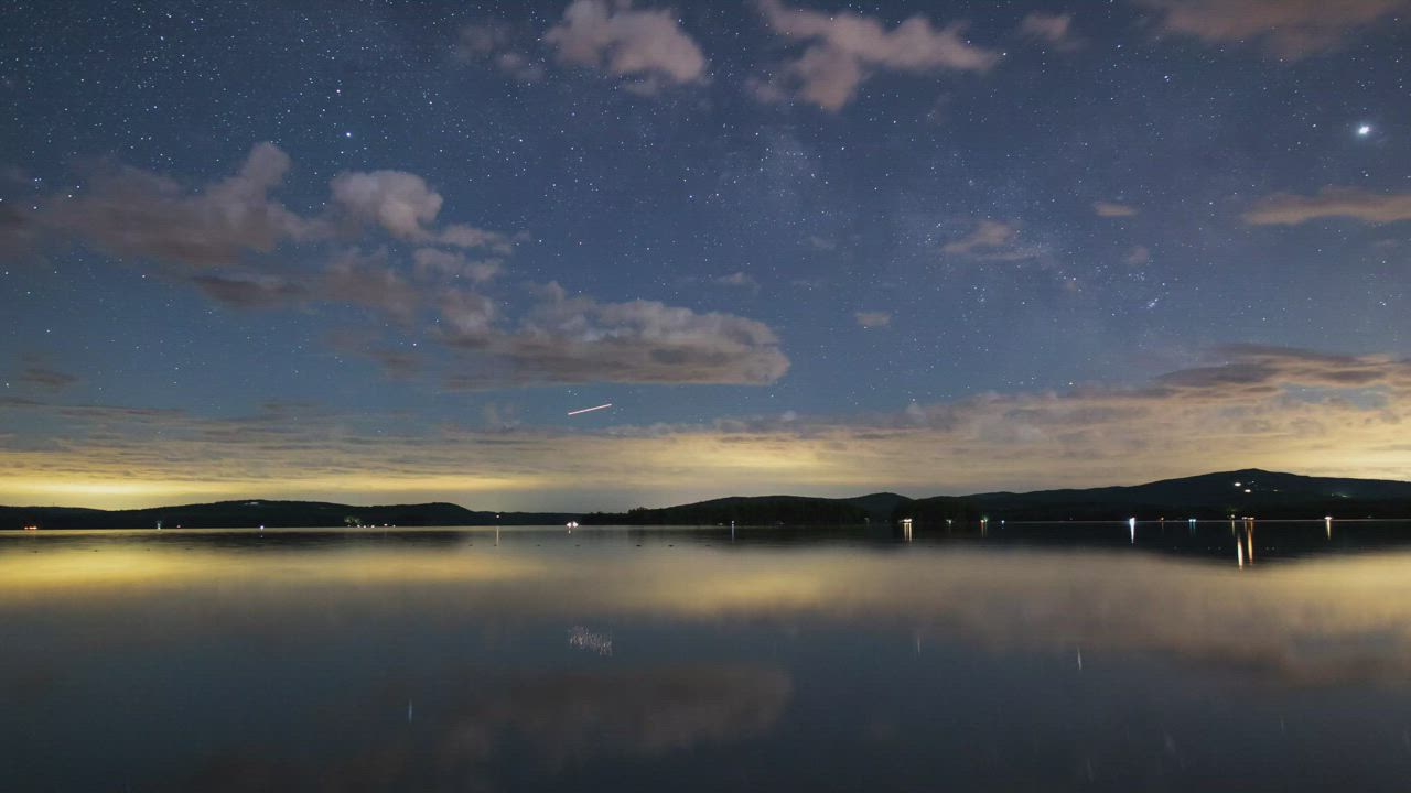 Night sky with stars at a calm lake, time lapse - Free Stock Video
