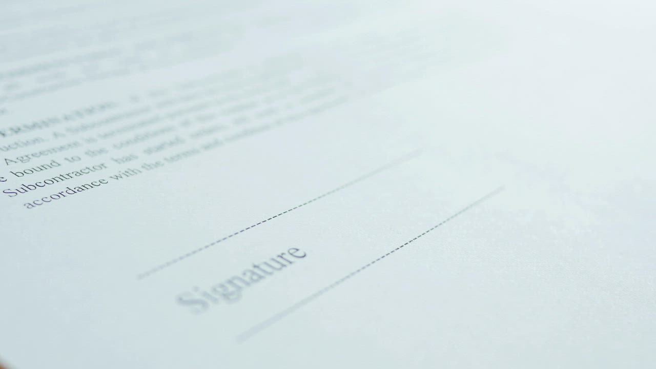 Signing the dotted line of a contract - Free Stock Video