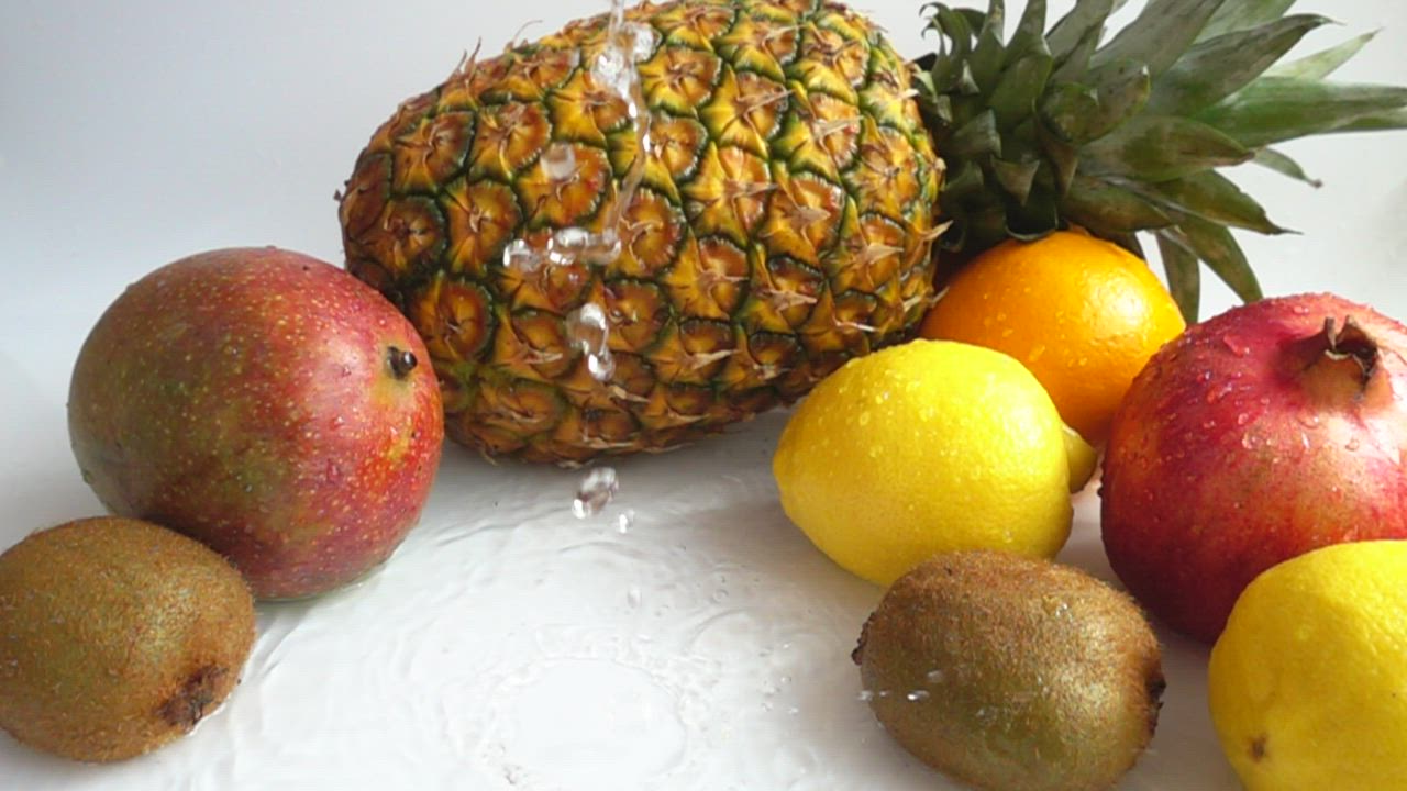 Tropical fruits and water - Free Stock Video