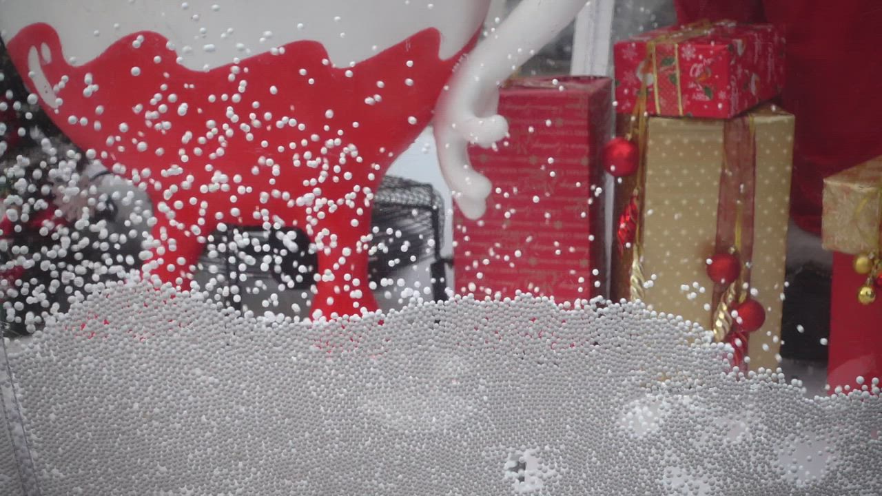 Fake snow in a window display - Free Stock Video