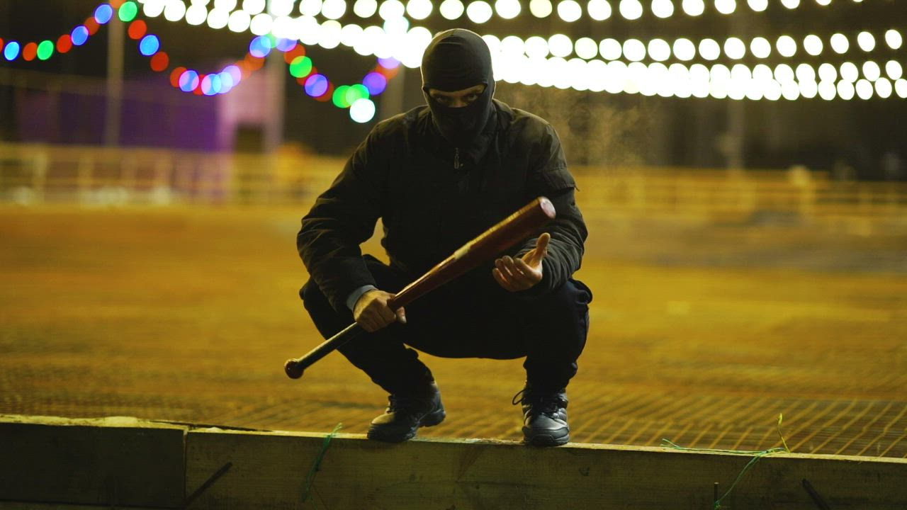 Bandit with a baseball bat - Free Stock Video