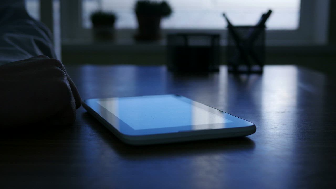 Using tablet at night - Free Stock Video
