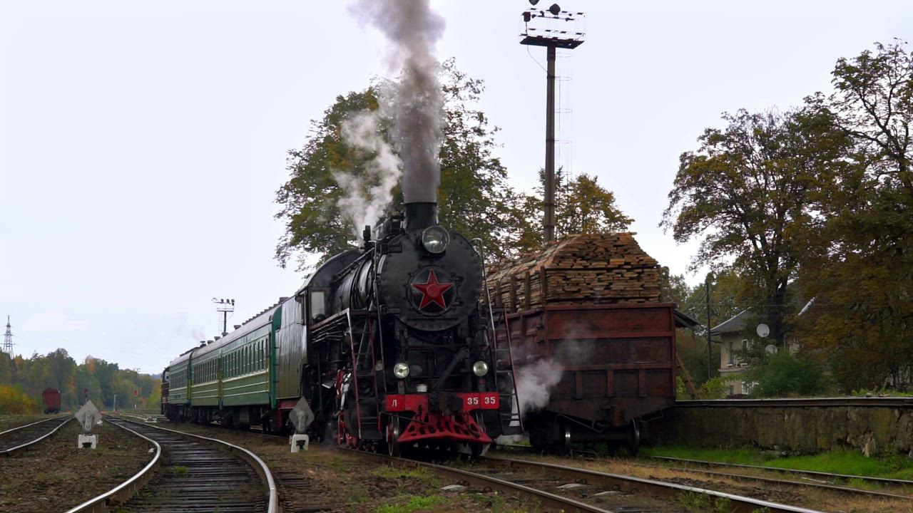 Old steam train starts to move - Free Stock Video