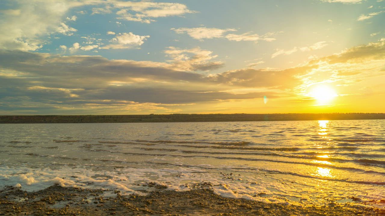 Sunset over the ocean landscape - Free Stock Video