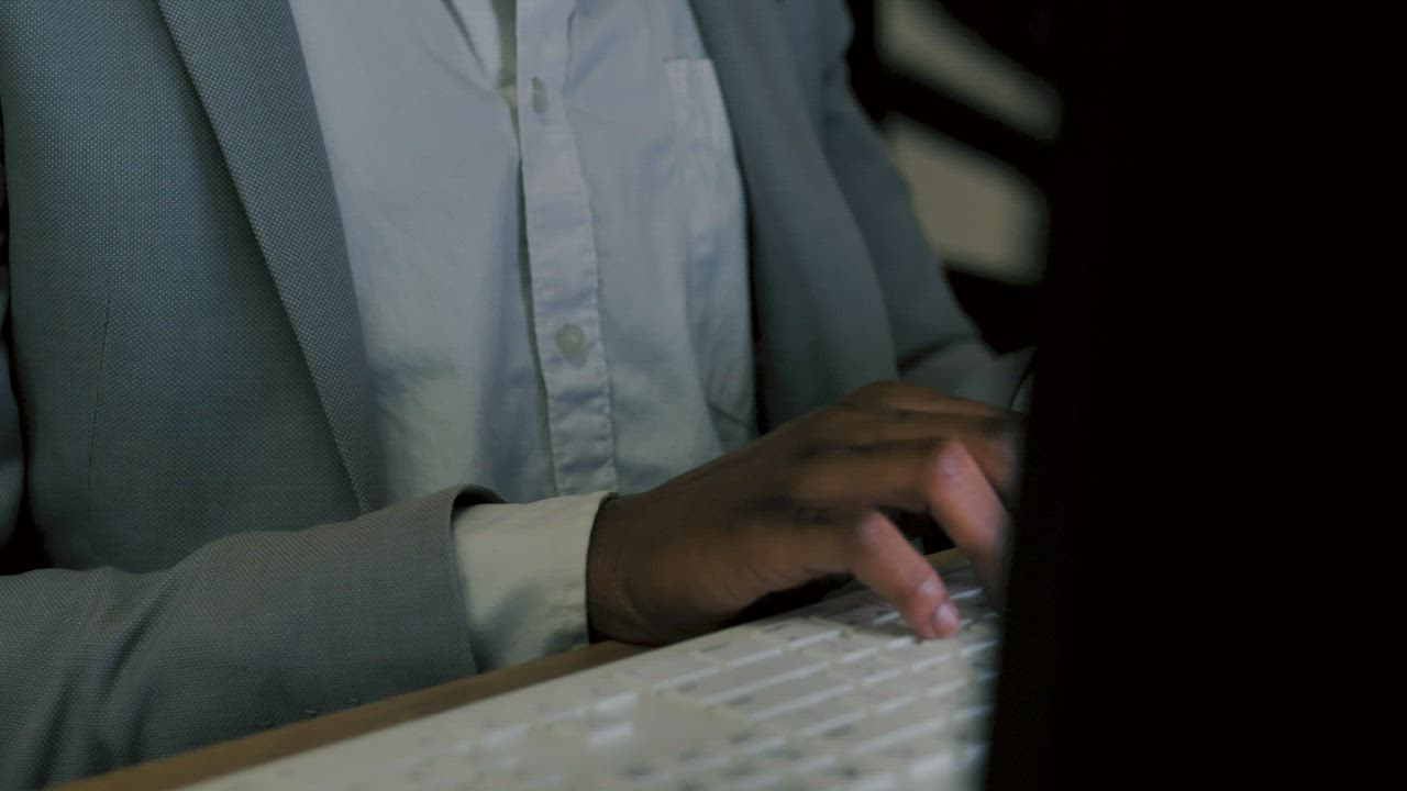 A person typing on a keyboard - Free Stock Video