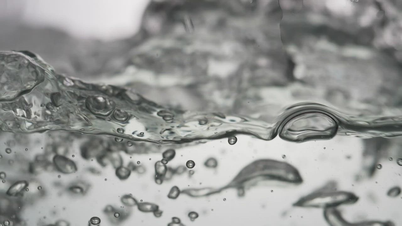 Bubbling water in slow motion - Free Stock Video