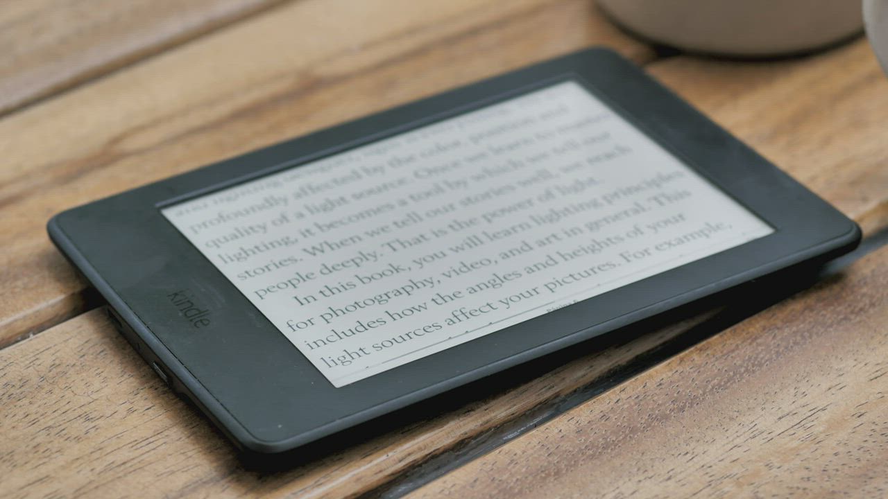 Ebook reader on a table - Free Stock Video