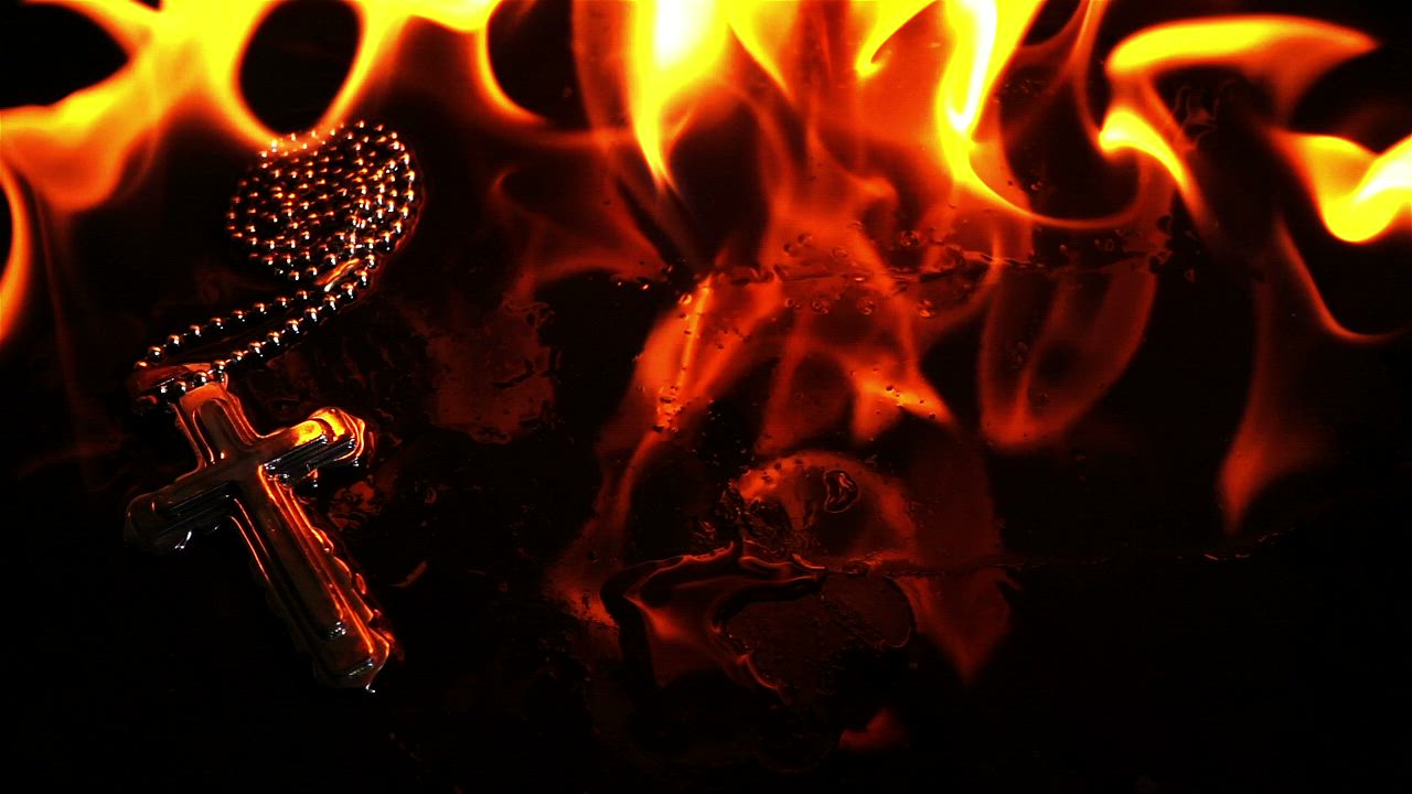 Necklace of a burning crucifix, close up - Free Stock Video