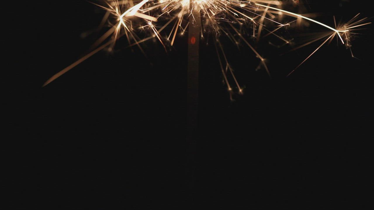 Sparkler light full of sparks - Free Stock Video