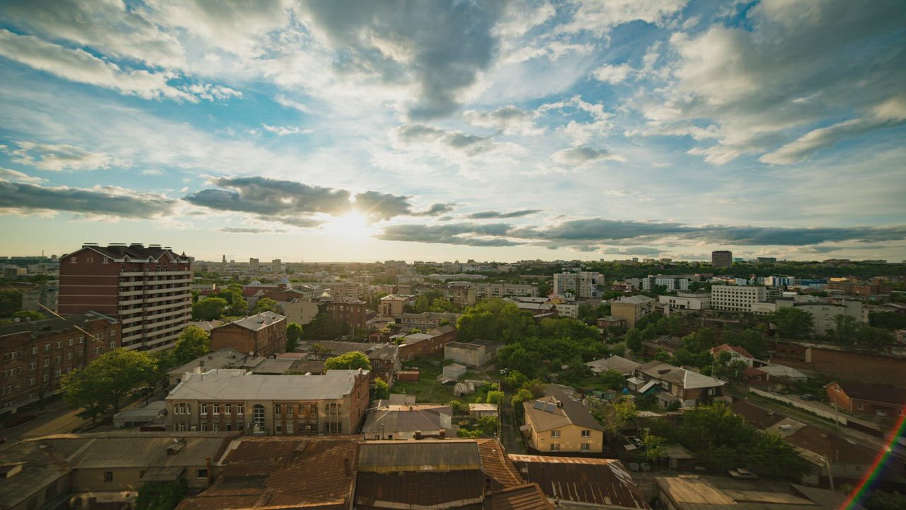 Top view of a town during sunset - Free Stock Video