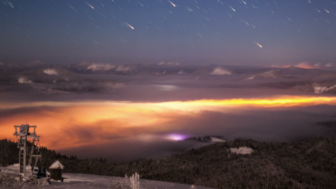 Impressive meteor shower seen from a mountain - Free Stock Video