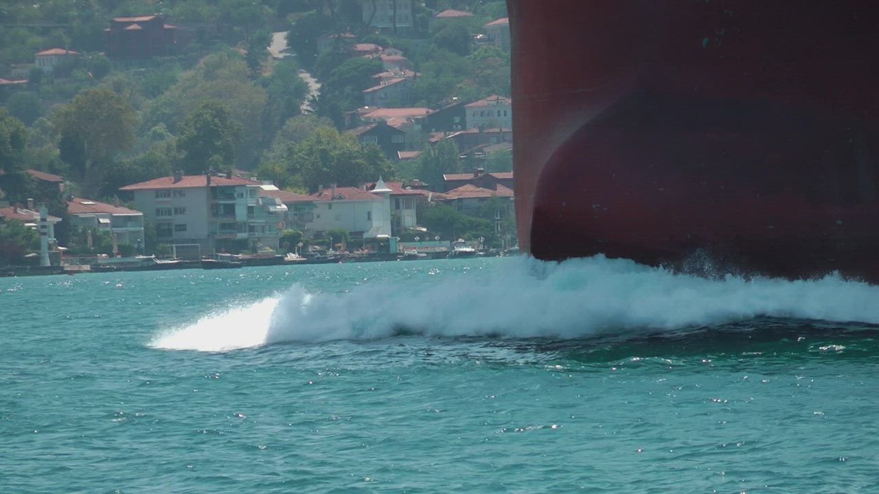 Cargo ship breaking through the water while sailing - Free Stock Video