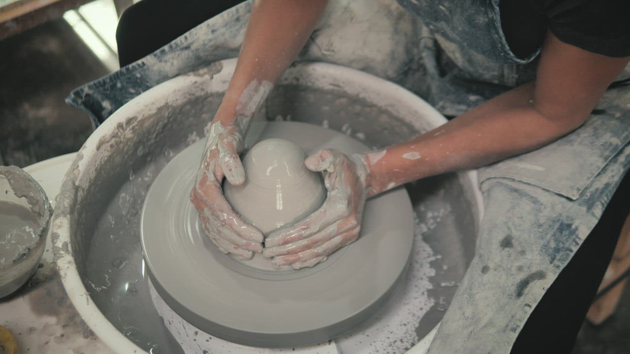 A ceramic artist modeling pottery - Free Stock Video