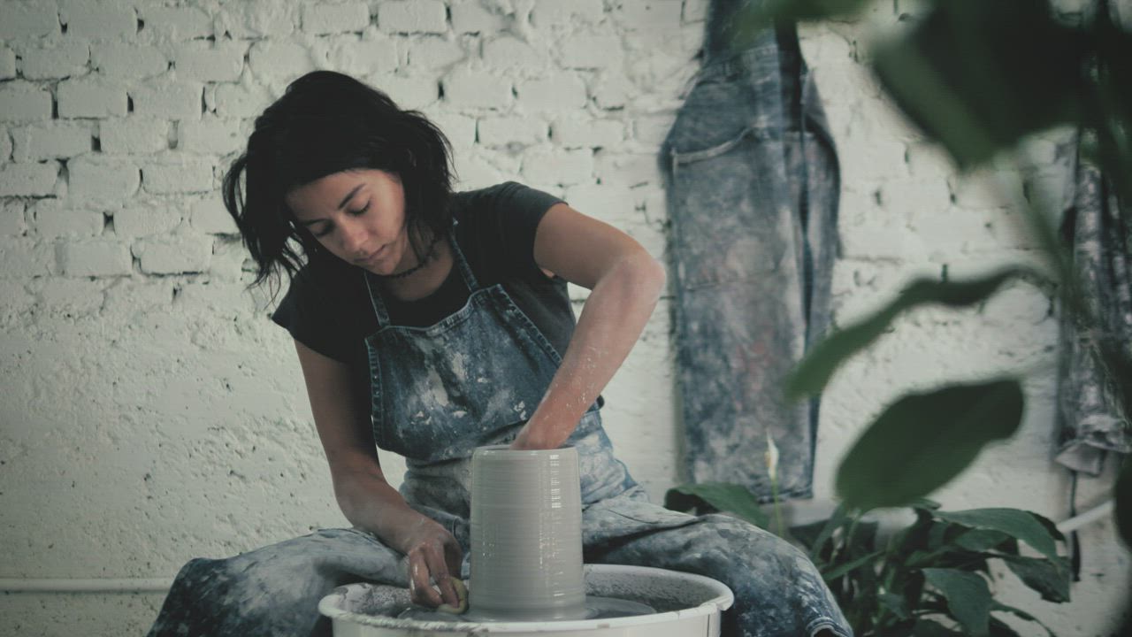 A female ceramic artist working - Free Stock Video