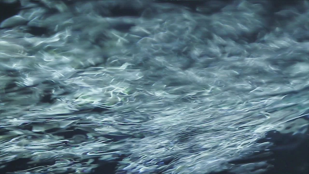 Fast moving liquid from below - Free Stock Video