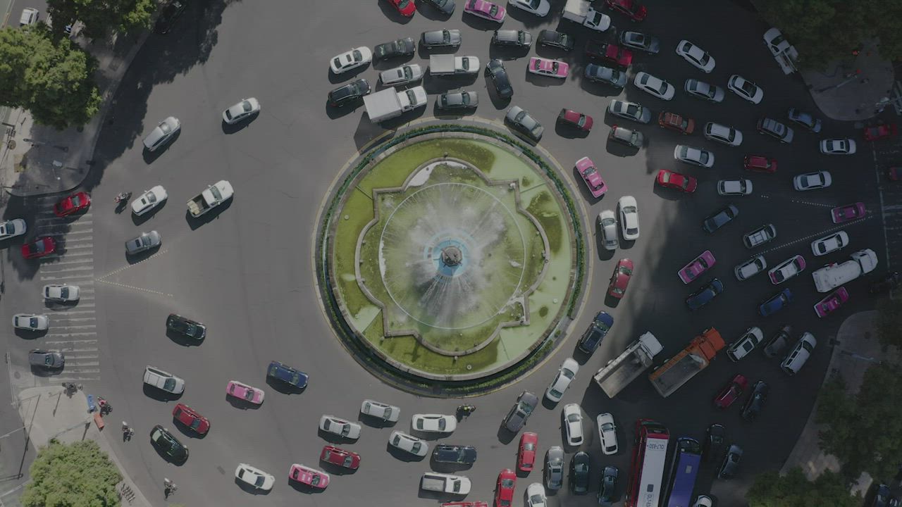 Roundabout with water fountain in middle - Free Stock Video