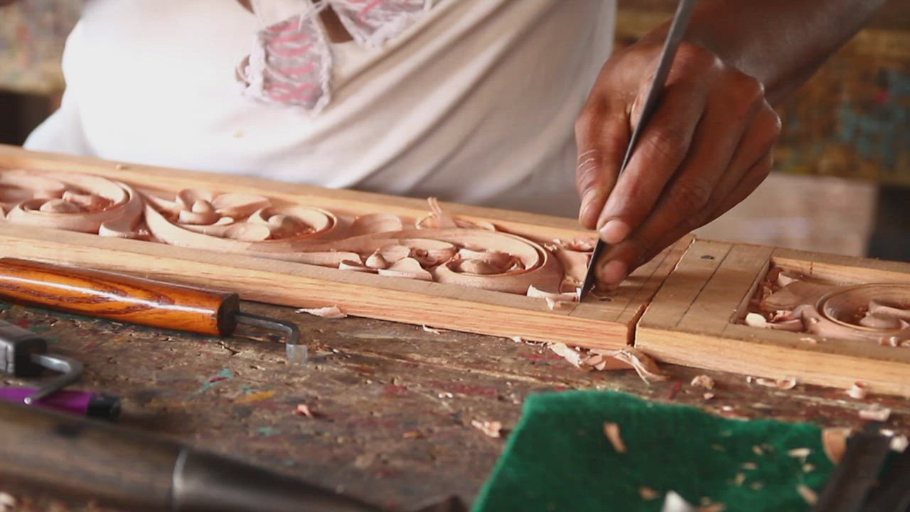Carving a design into wood - Free Stock Video