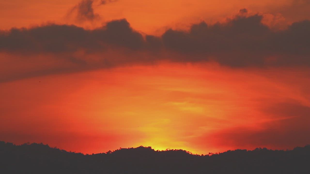 Bright orange sky at sunrise - Free Stock Video
