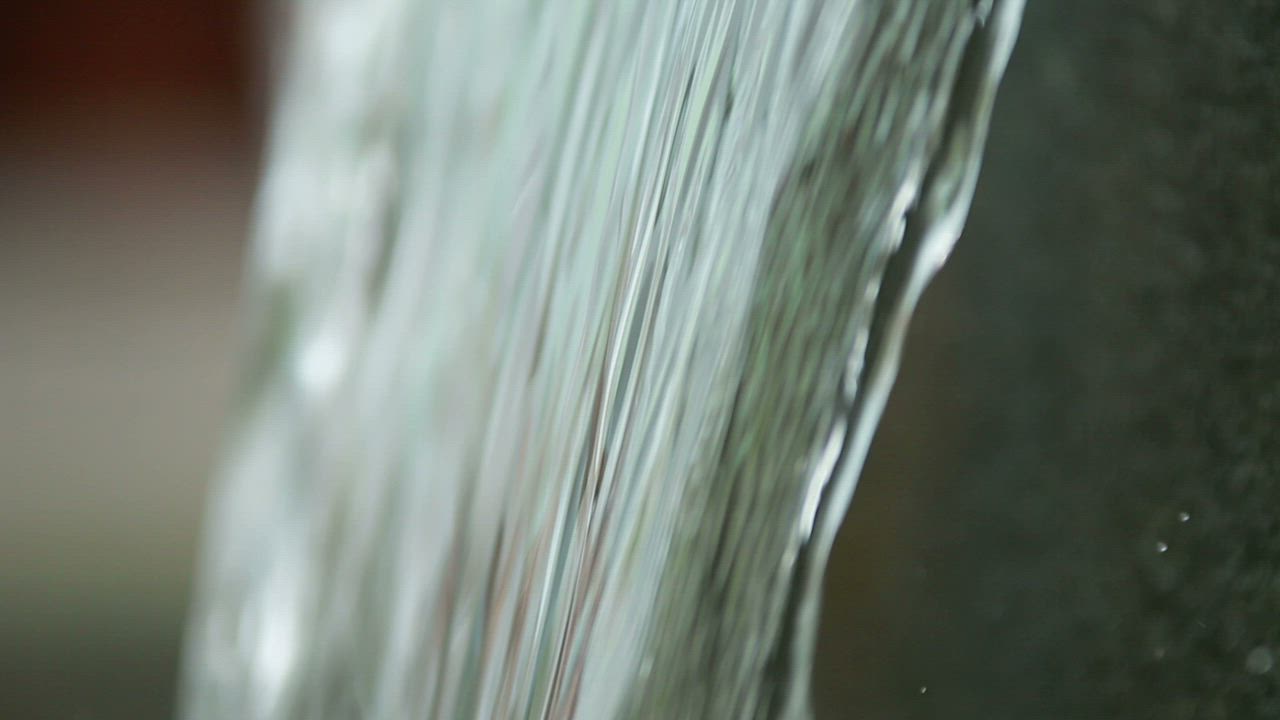 Water pouring from a fountain - Free Stock Video