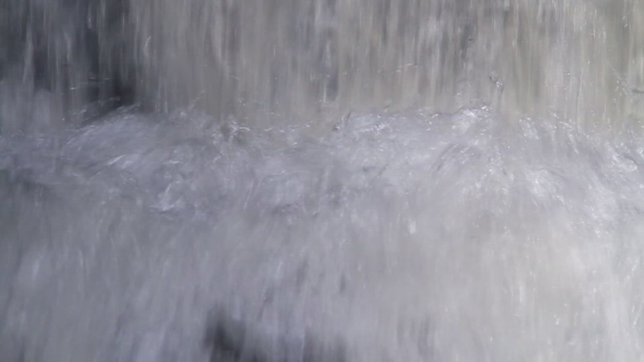 Waterfall splashing on a ledge - Free Stock Video