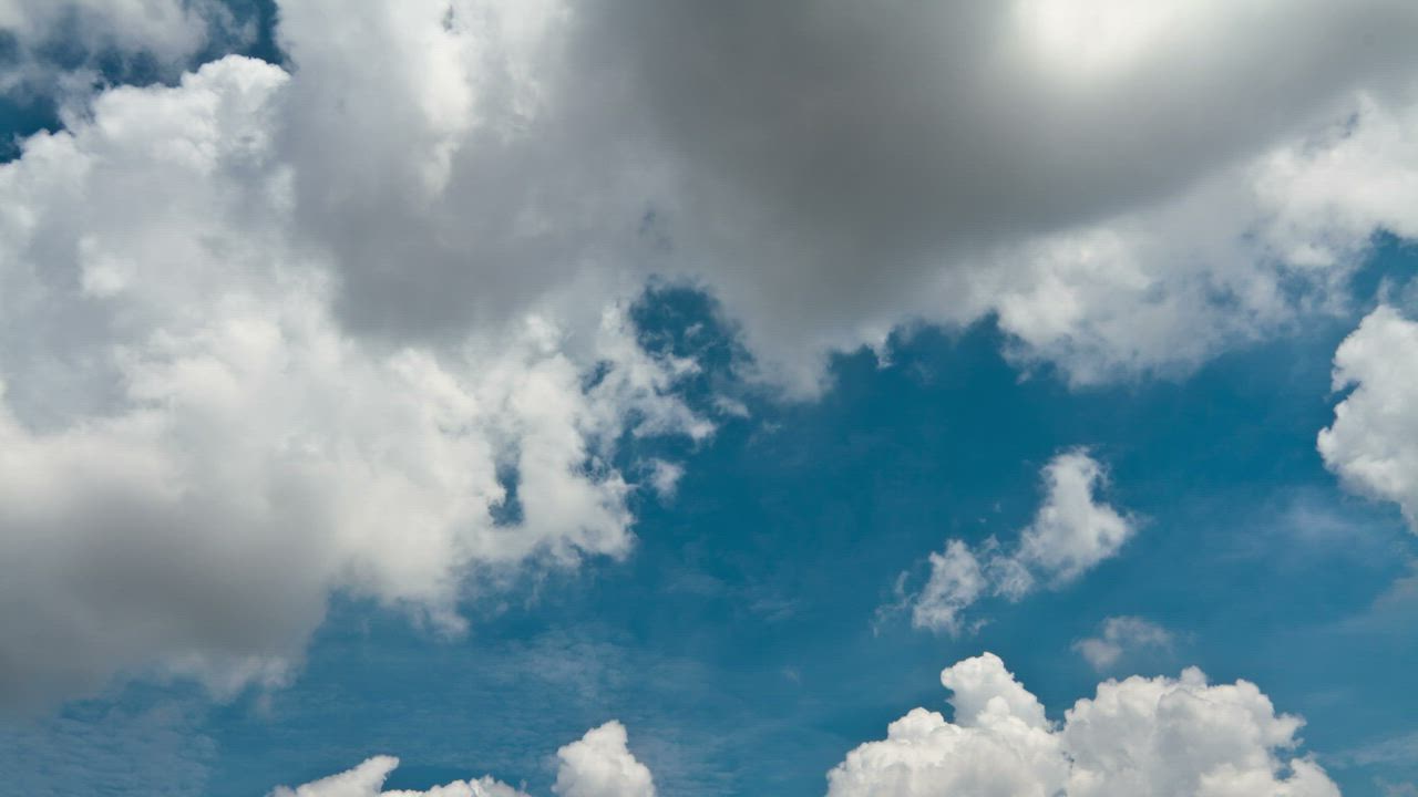Timelapse of white clouds forming - Free Stock Video