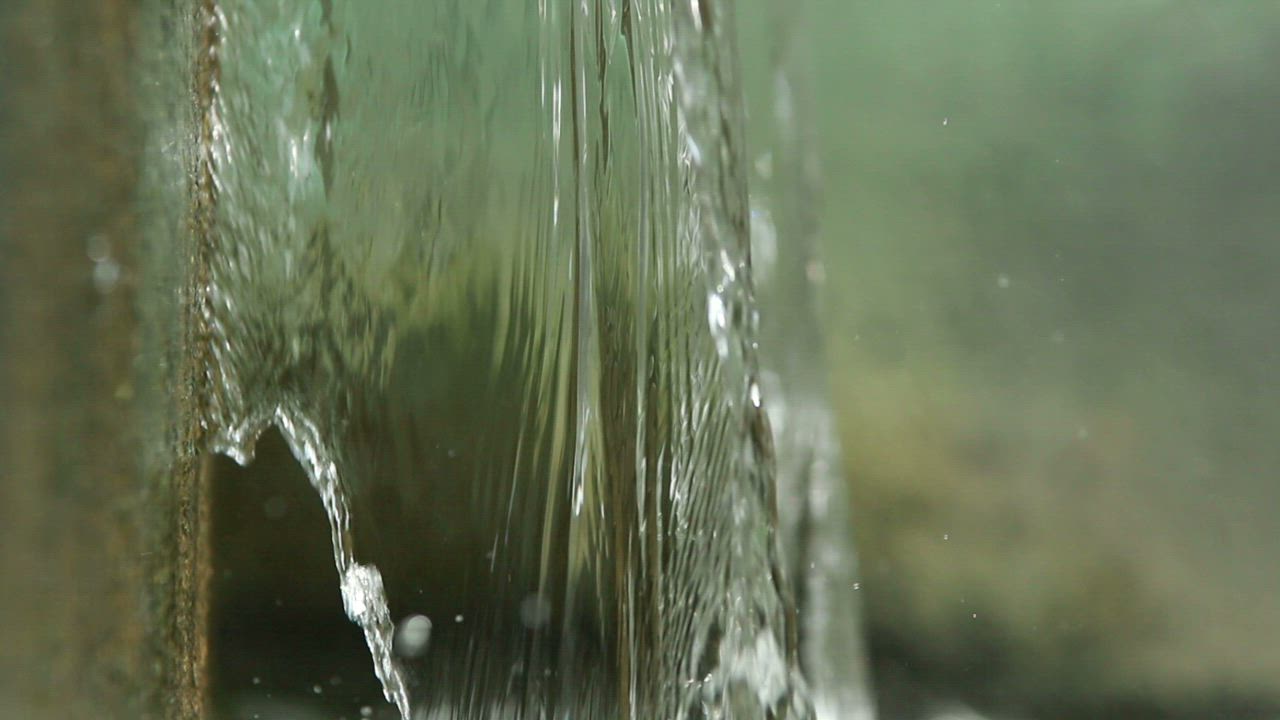 Texture of water flowing from a fountain - Free Stock Video