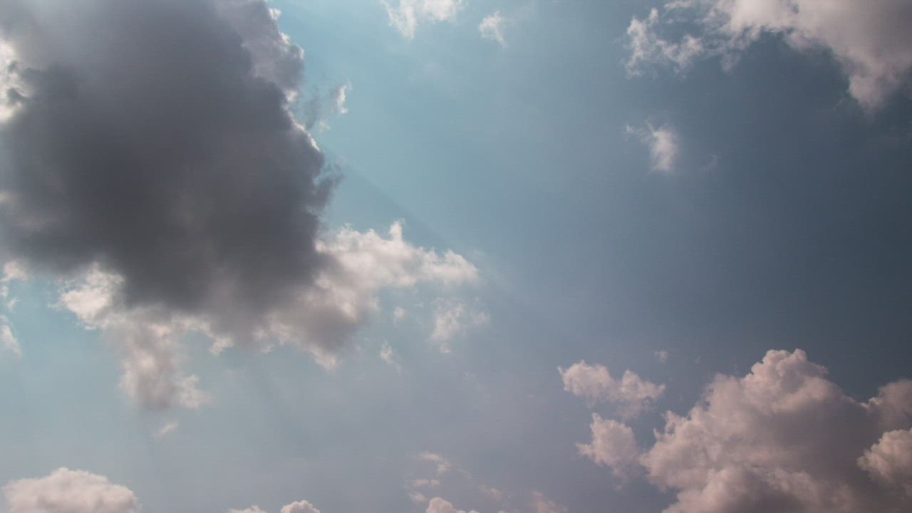 Rain clouds forming over land - Free Stock Video