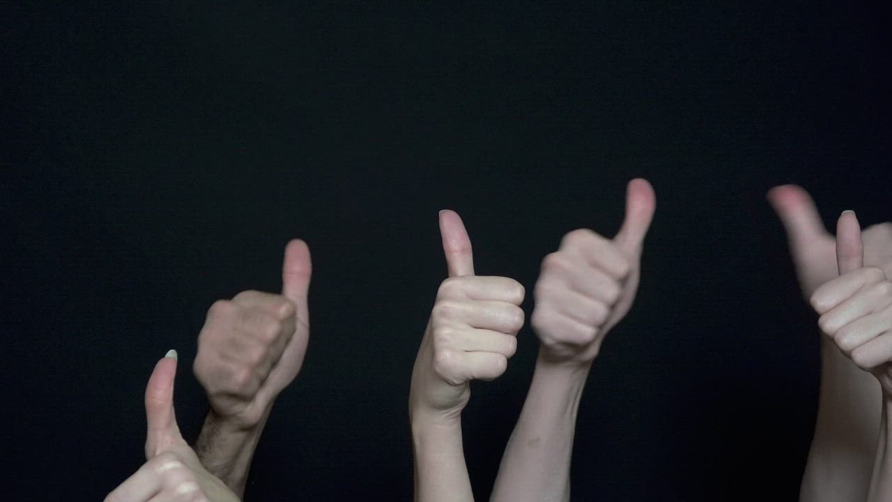 Group of people giving a thumbs up - Free Stock Video