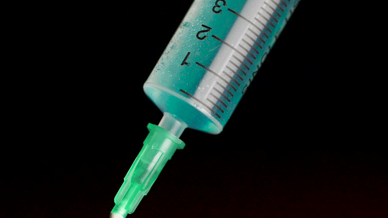 Vaccine inside a syringe - Free Stock Video
