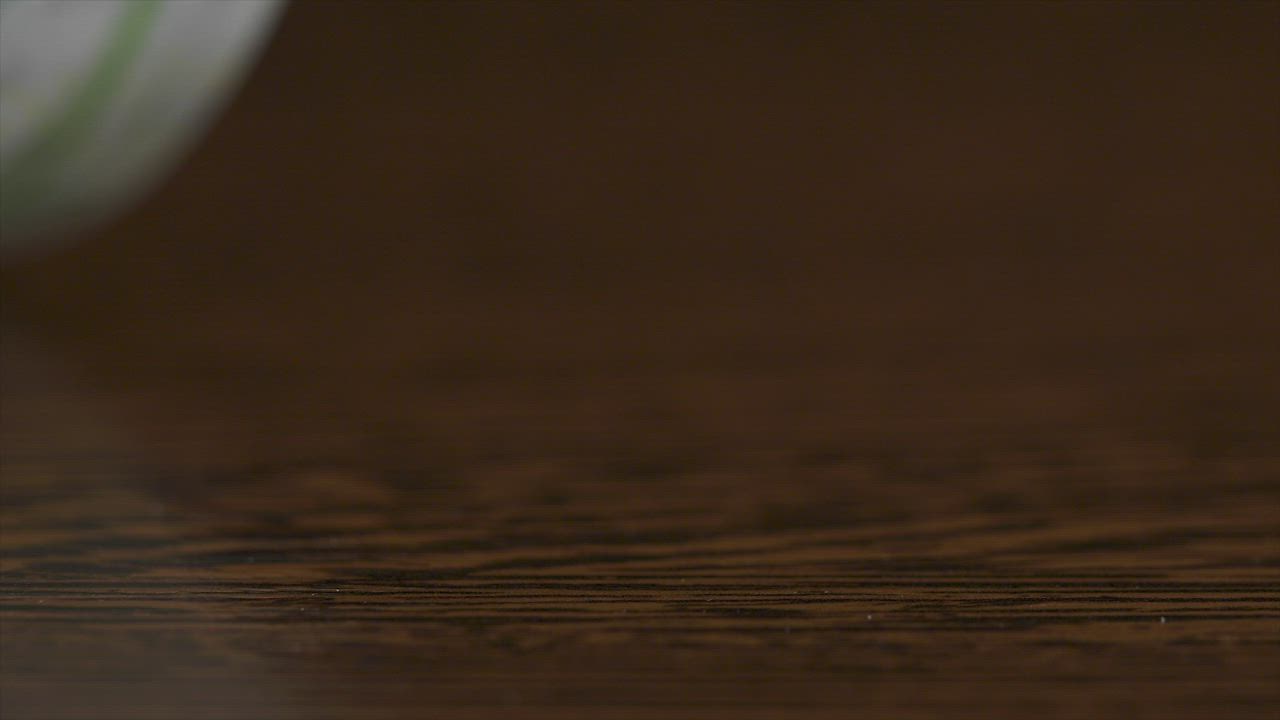 Counting money on a table - Free Stock Video