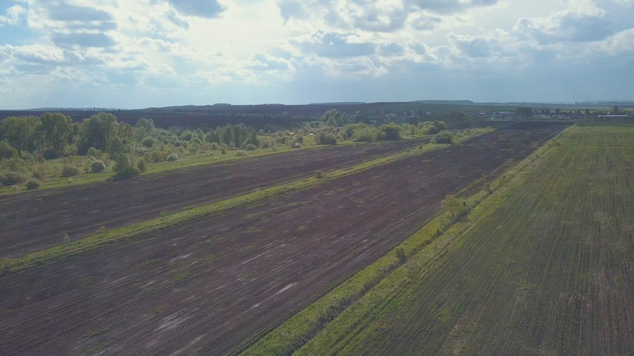 Long fields in the countryside - Free Stock Video