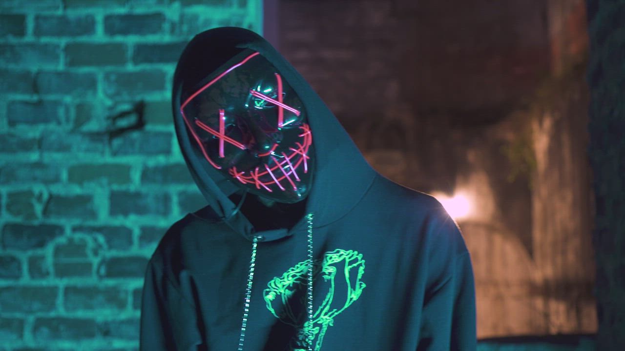 Man with LED light mask - Free Stock Video