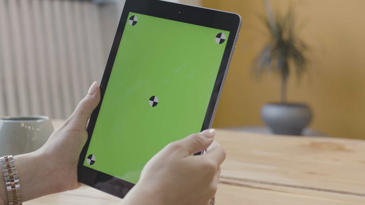 Woman scrolling down on a tablet - Free Stock Video