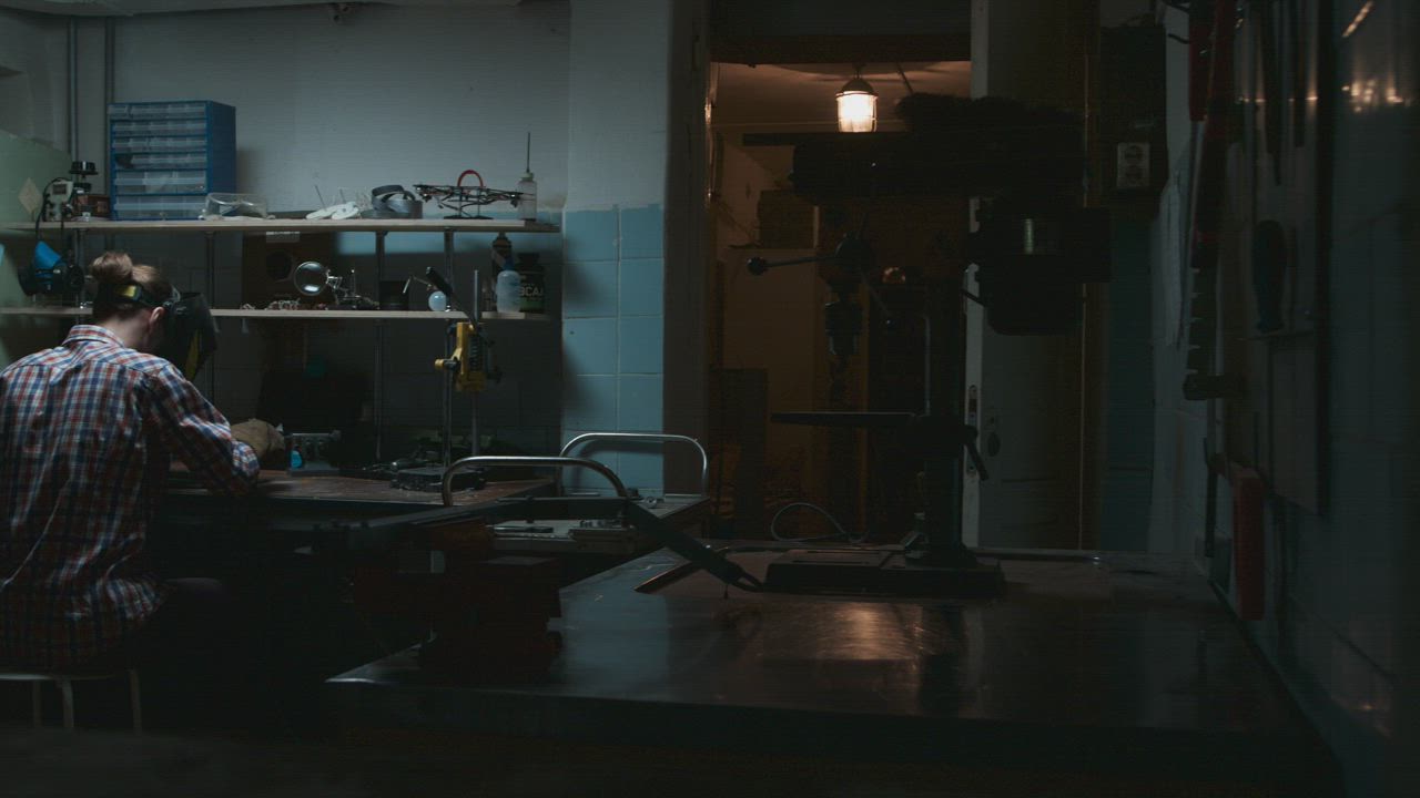 Welder working at a bench - Free Stock Video