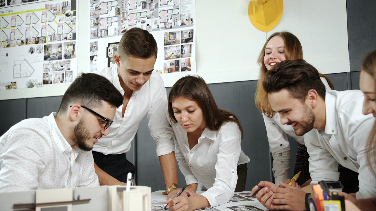 Work group planning an architectural project - Free Stock Video