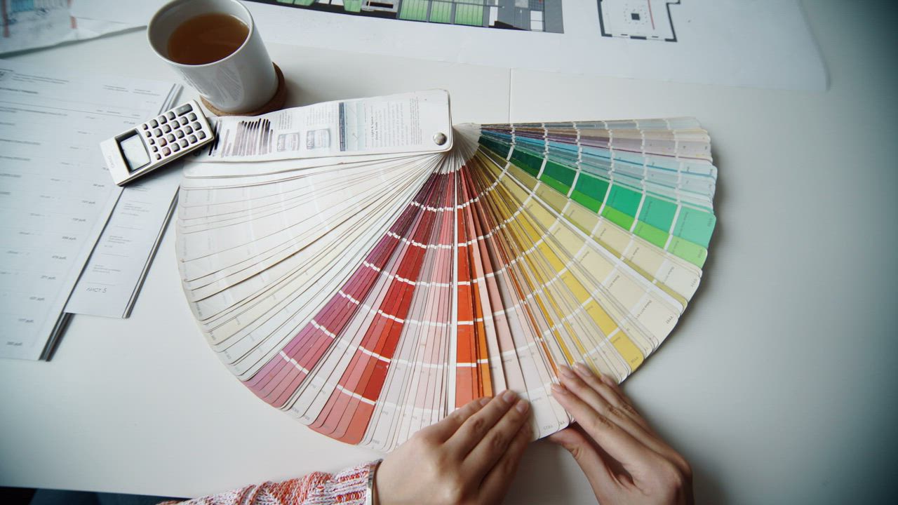 Architect choosing a color from the color plate - Free Stock Video