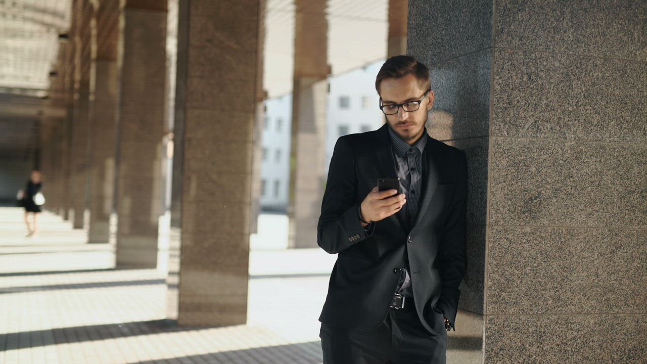 Lawyer using mobile cellphone - Free Stock Video