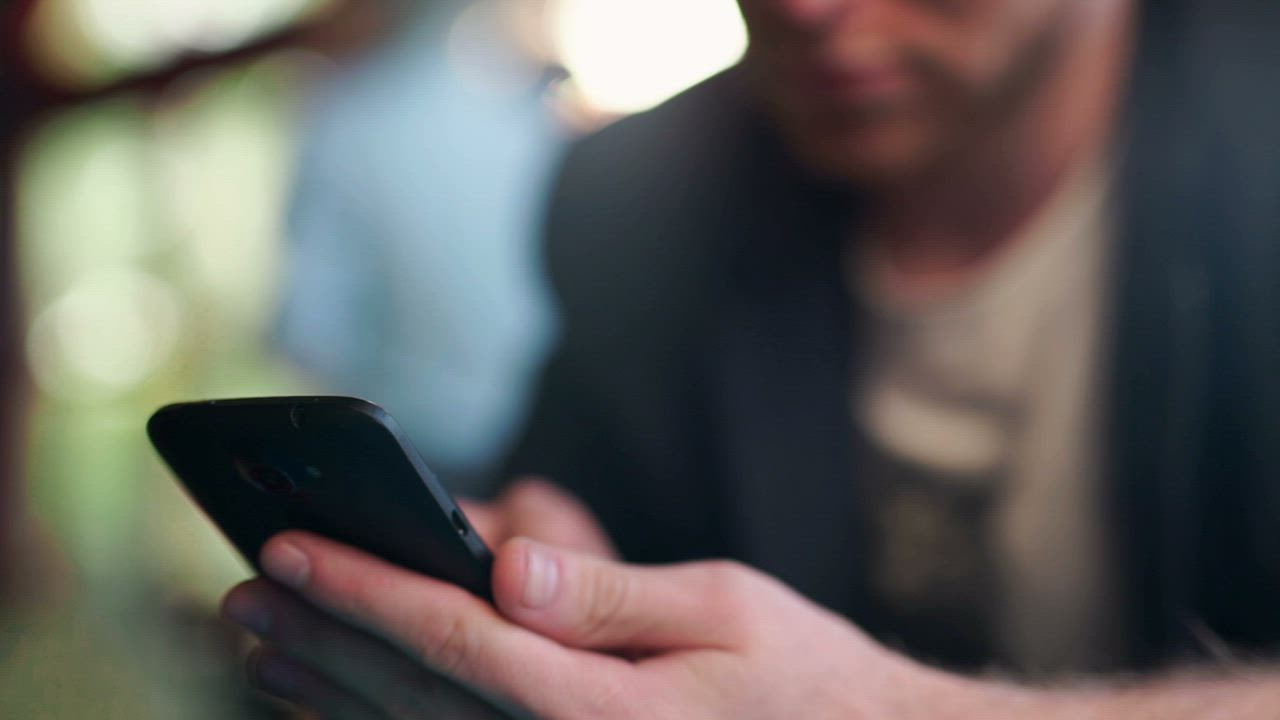 Person using his smartphone - Free Stock Video